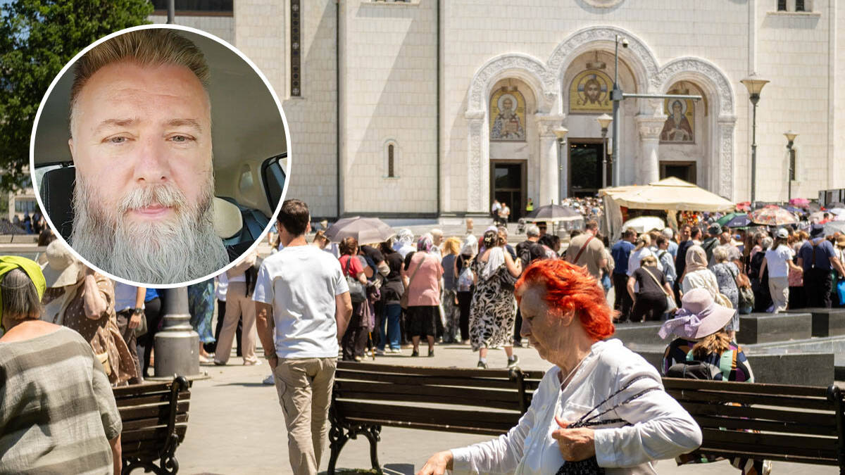Otac Predrag Popović brani vernike koji celivaju Časni Pojas Bogorodice ...